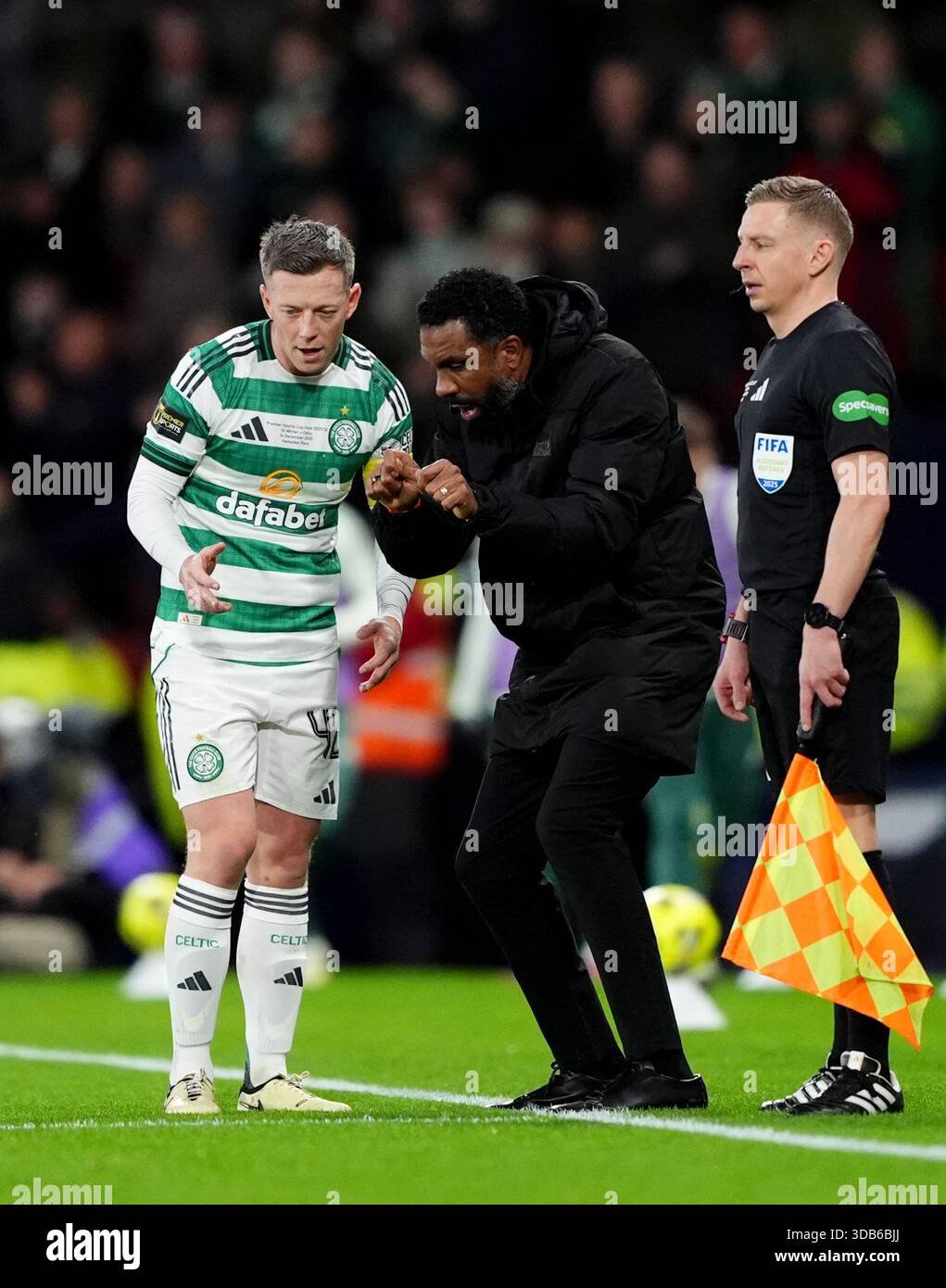Celtic manager Wilfried Nancy (centre) speaks with captain Callum ...