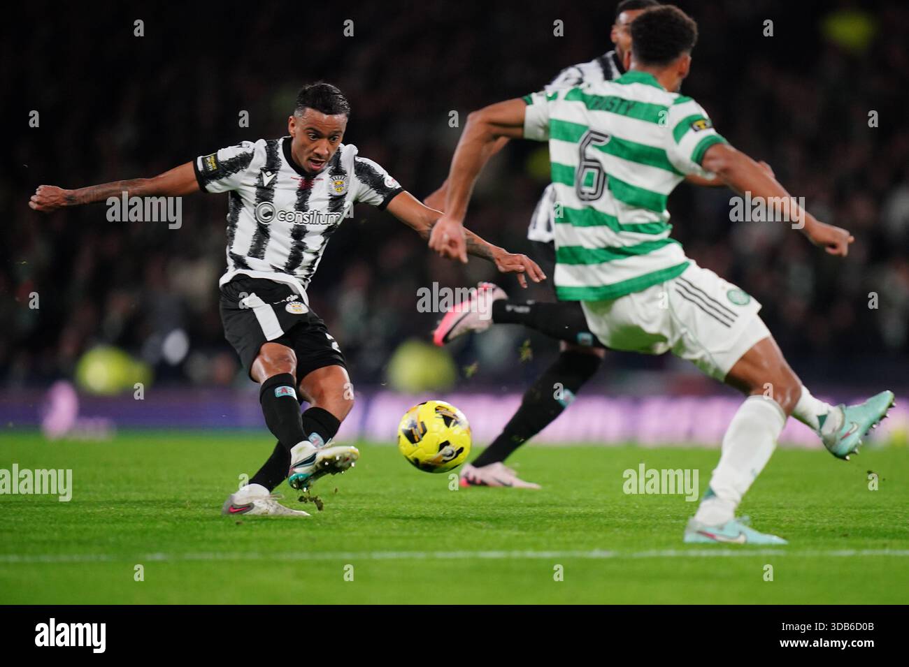 St Mirren's Keanu Baccus (left) has an attempt at goal during the ...