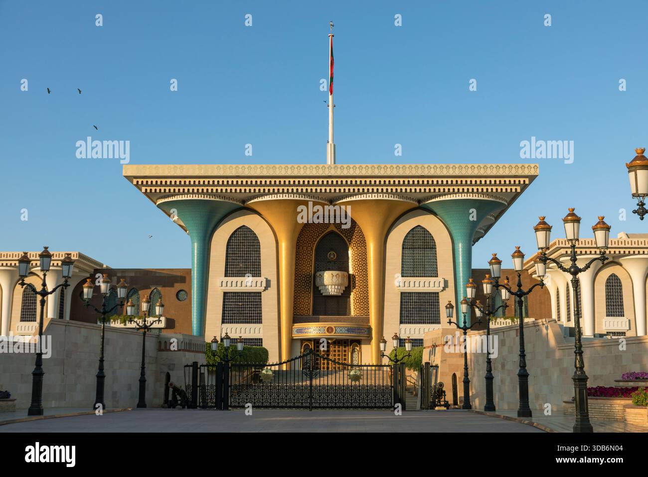 Traditional Omani architecture featuring colorful columns and arches ...