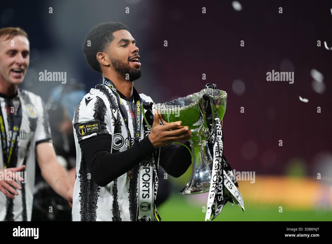 St Mirren's Miguel Freckleton celebrates with the trophy after winning ...
