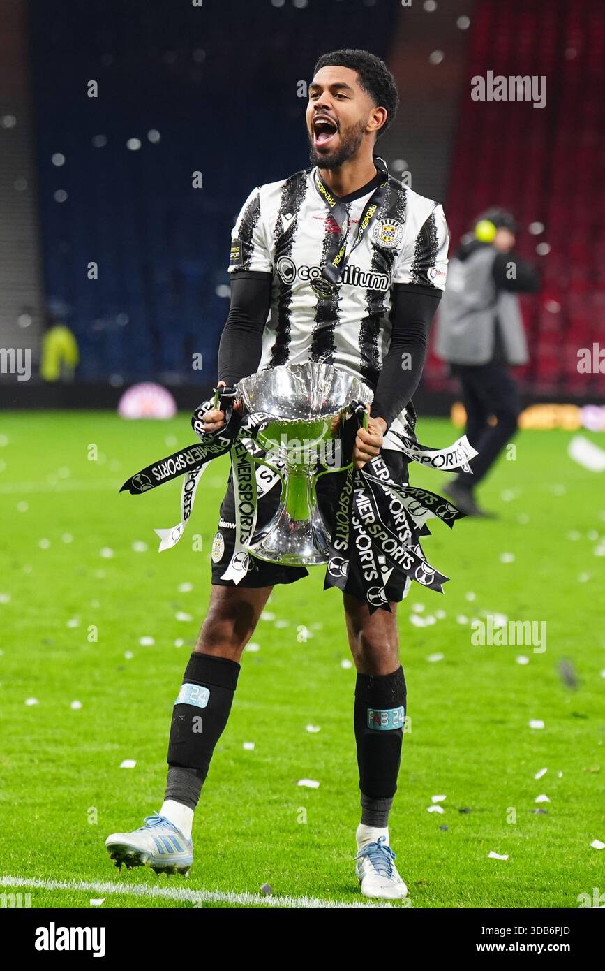 St Mirren's Miguel Freckleton holding the trophy after the final ...