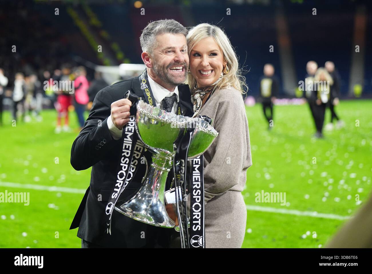 St Mirren manager Stephen Robinson with his wife whilst holding the ...