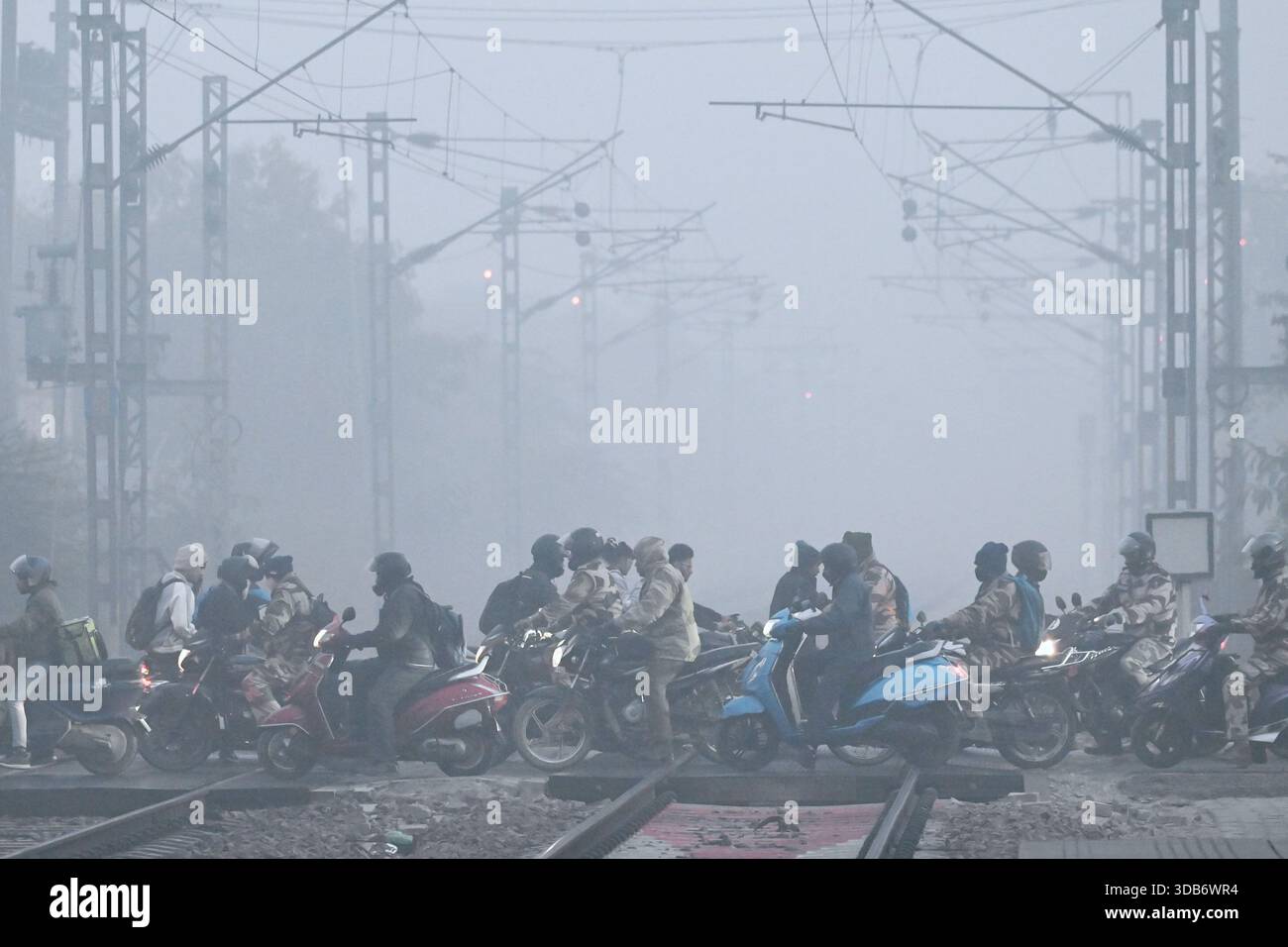 NEW DELHI, INDIA - DECEMBER 14: Morning Smog at a Railway Crossing in ...