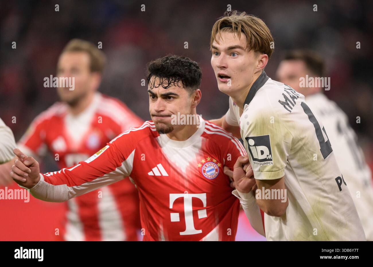 from left Aleksandar Pavlovic (Bayern), Kacper Potulski Munich ...