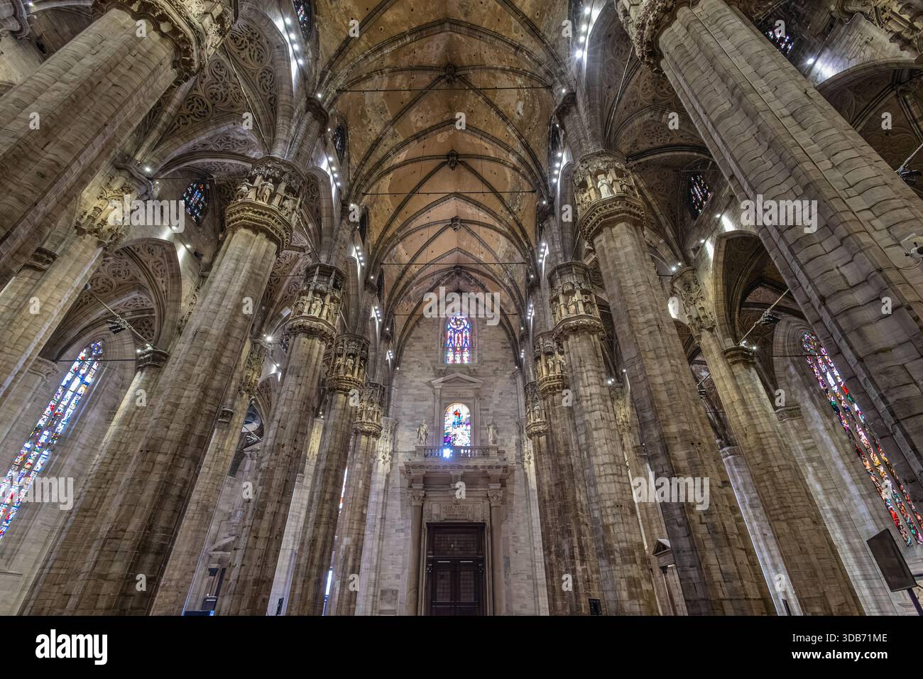 A stunning Gothic cathedral interior featuring towering stone columns ...