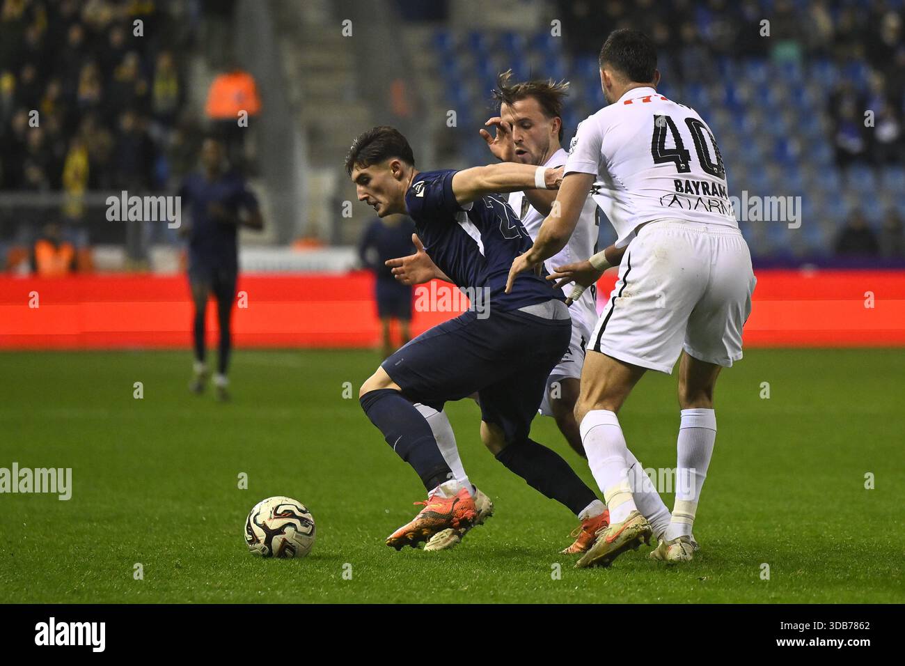 Genk's Robin Mirisola, Westerlo's Tuur Rommens and Westerlo's Emin ...