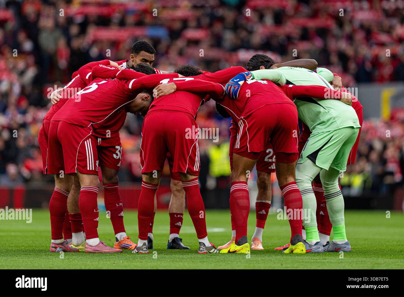 Liverpool's players in a huddle before the Premier League match between ...