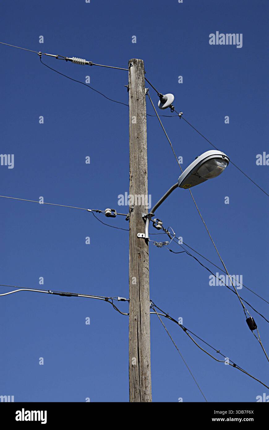 LEWISTON/IDAHO /USA- Wooden Electric pole bulb light is paid by private ...