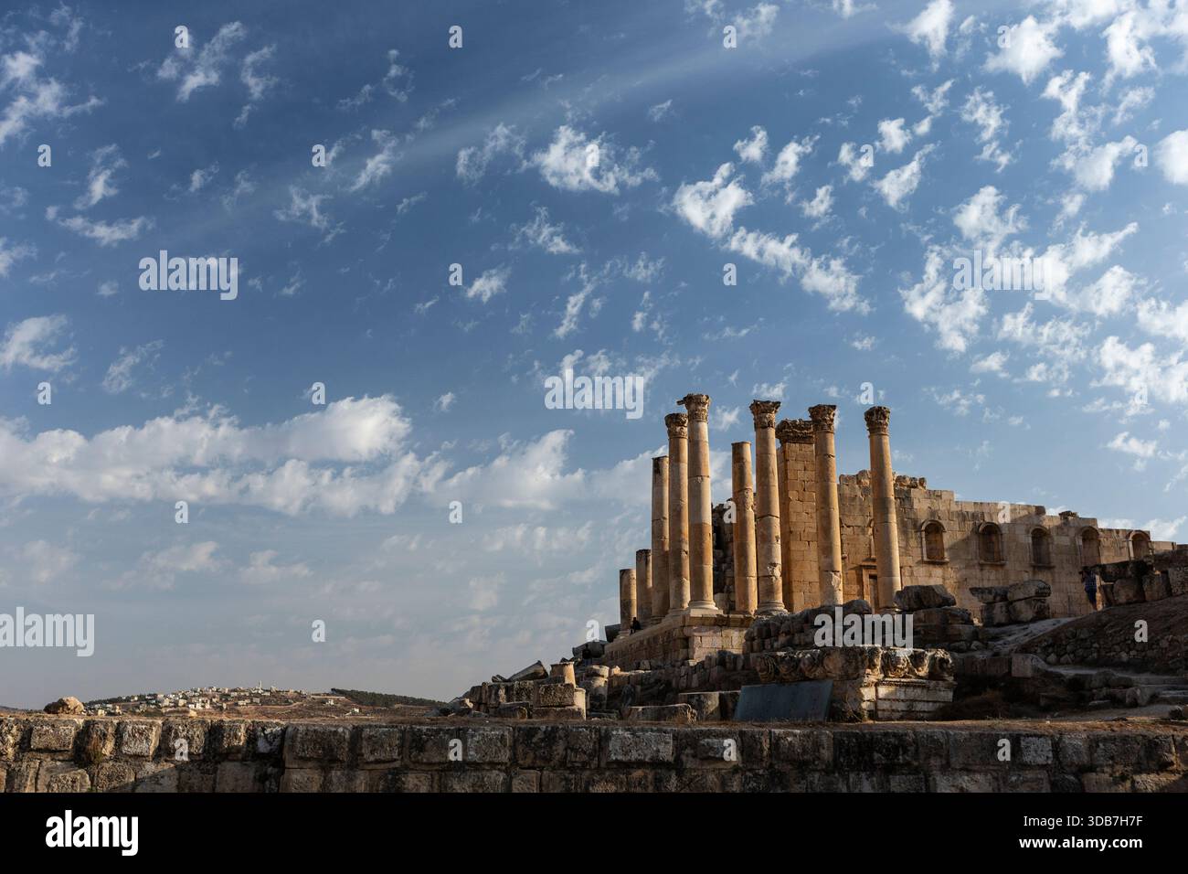 Tall stone columns of the Temple of Artemis stand among ancient ruins ...