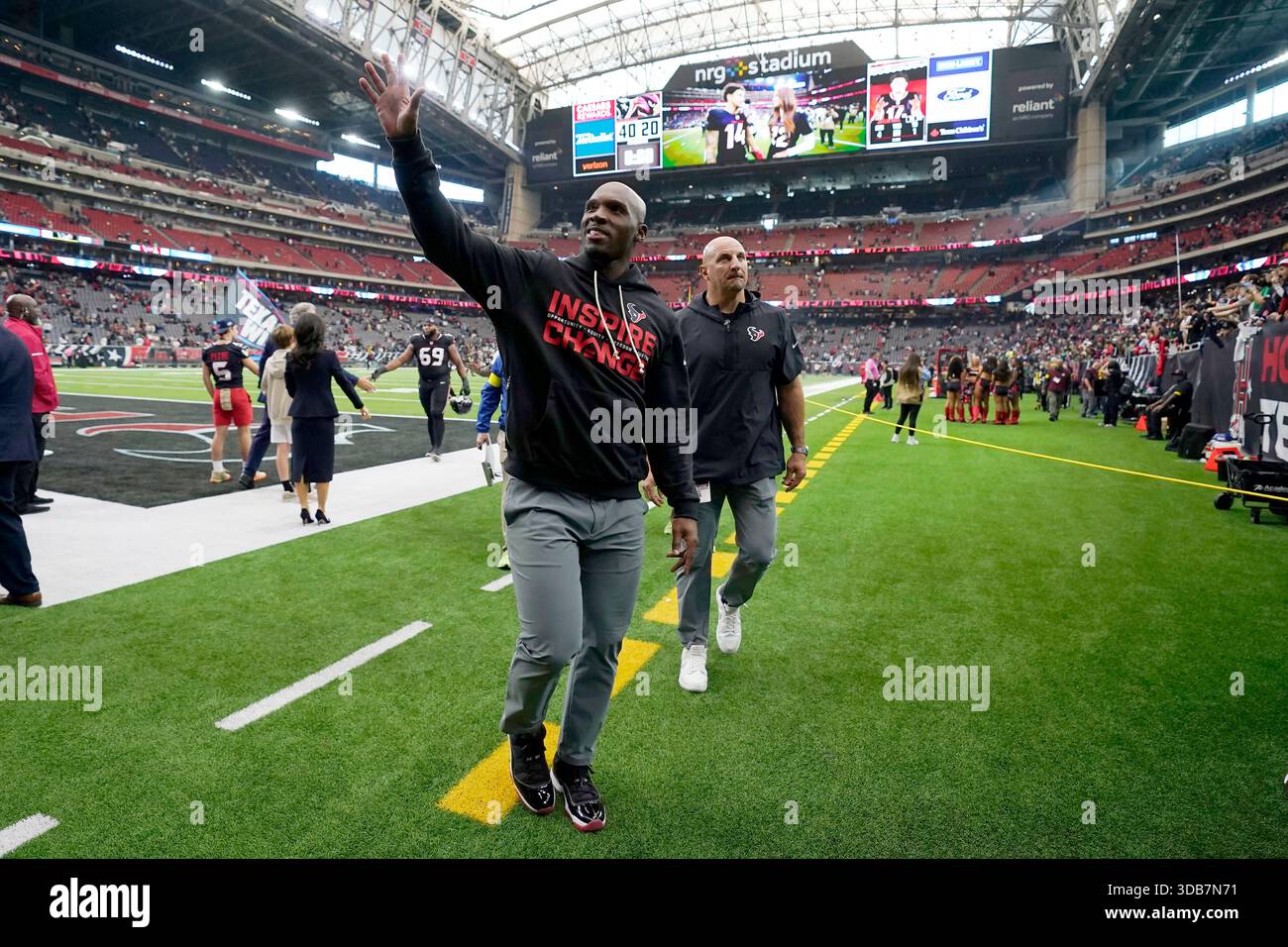 Houston Texans head coach Demeco Ryans smiles as he waves to fans after ...