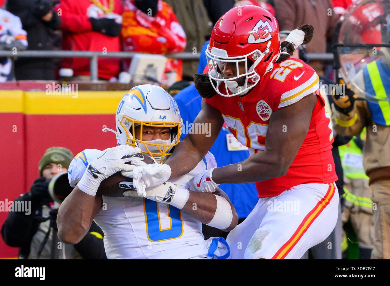 Los Angeles Chargers linebacker Daiyan Henley (0) intercepts a pass to ...