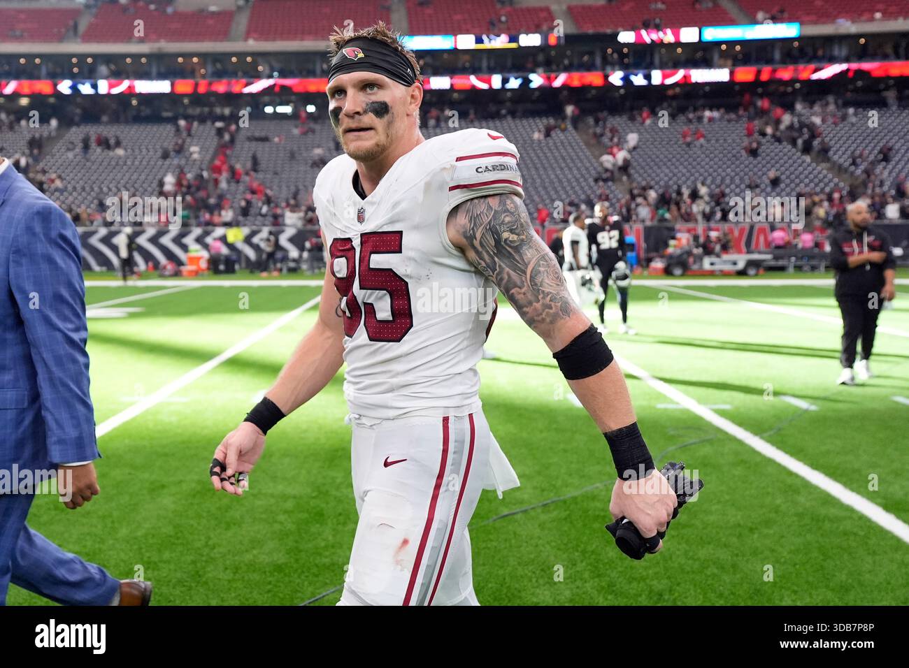 Arizona Cardinals tight end Trey McBride walks off the field after an ...
