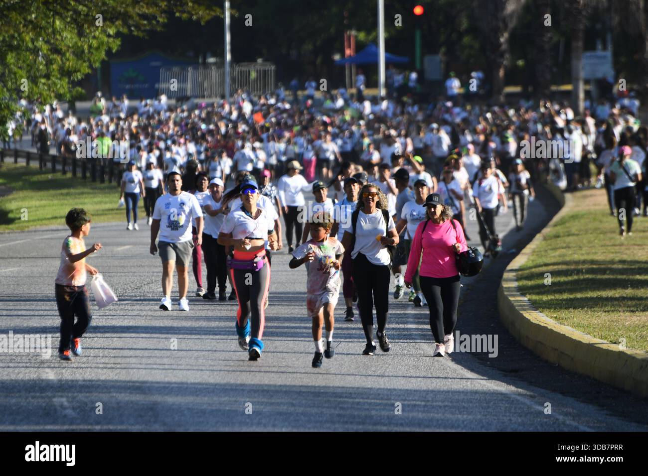 People join a city-organized public walk in San Diego, Venezuela ...