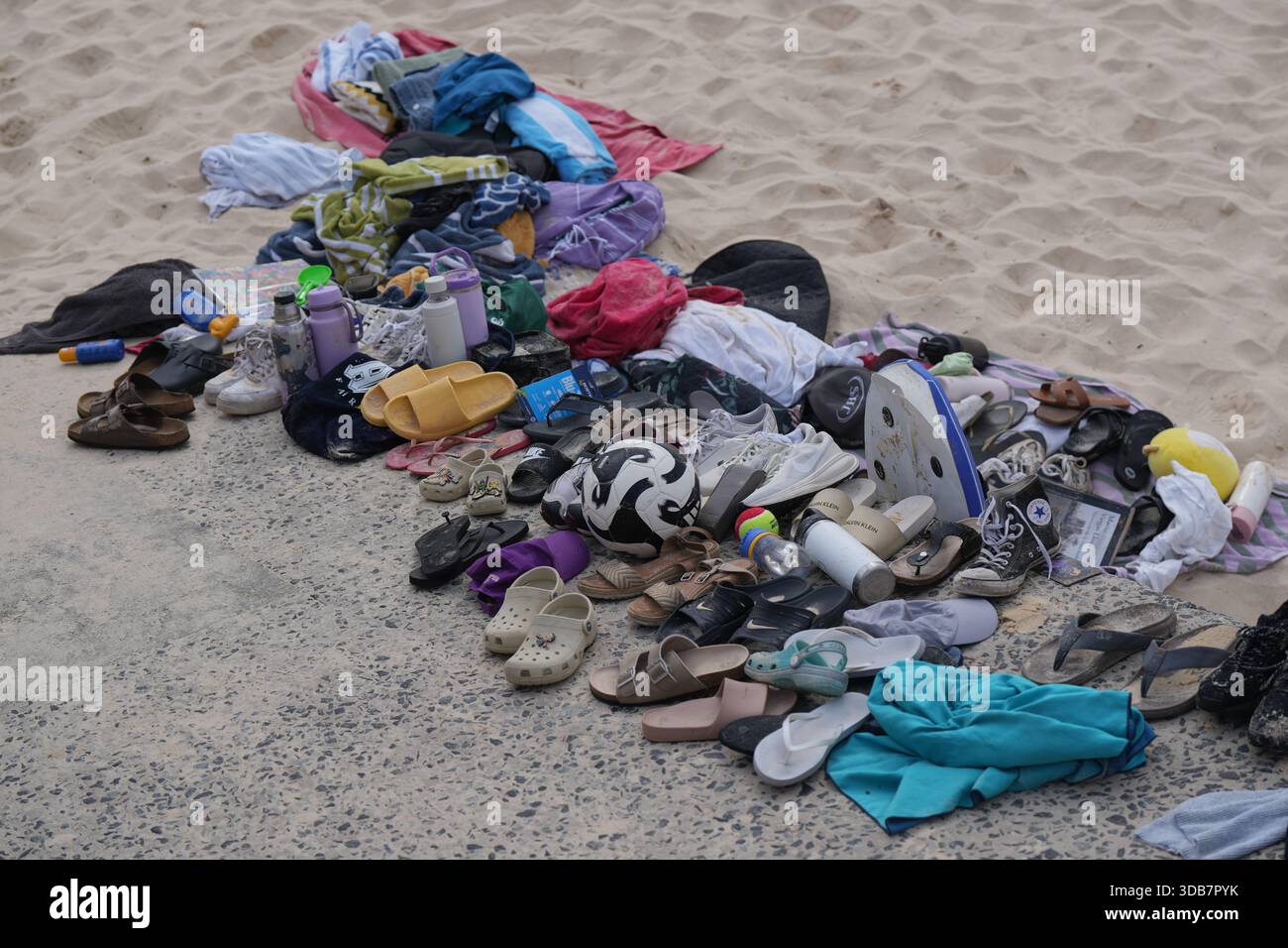 Belongings sit piled up after a shooting the day prior at Sydney's ...