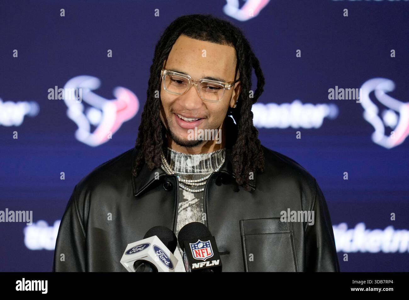 Houston Texans quarterback C.J. Stroud smiles as he answers a question ...