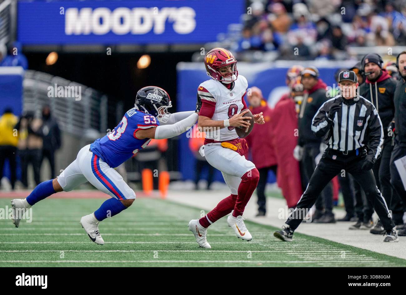 New York Giants linebacker Darius Muasau (53) forces Washington ...