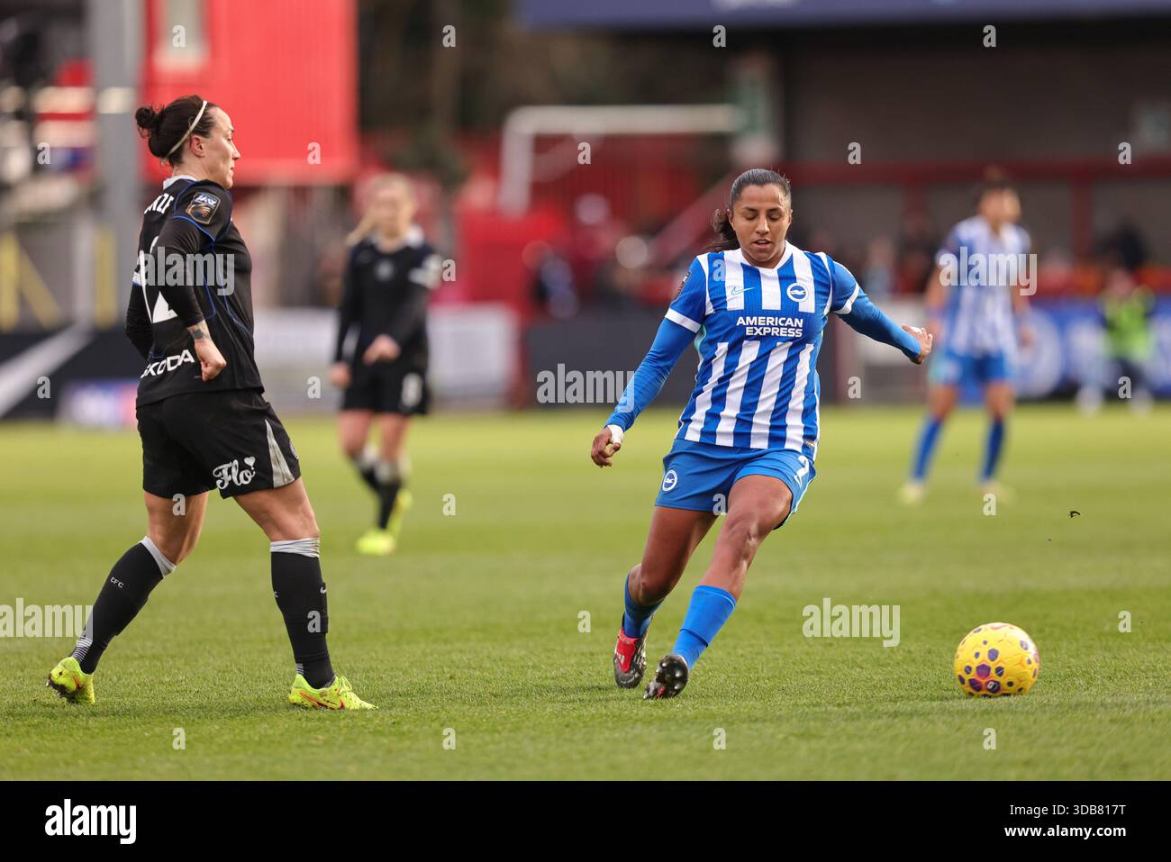 Lucy Bronze (22 Chelsea) and Manuela Vanegas Catano (2 Brighton & Hove Albion) during the ...