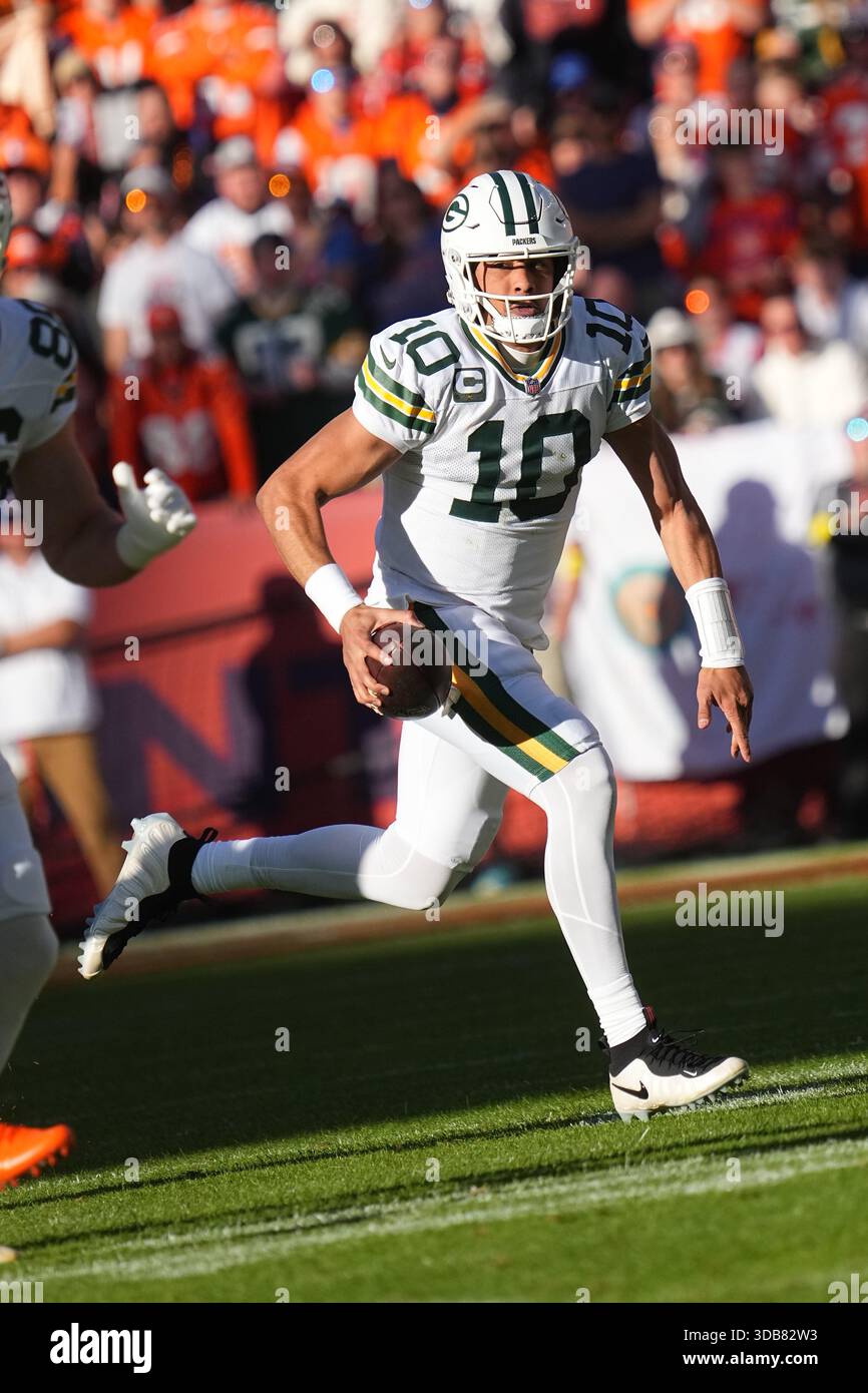 Green Bay Packers quarterback Jordan Love (10) runs the football ...