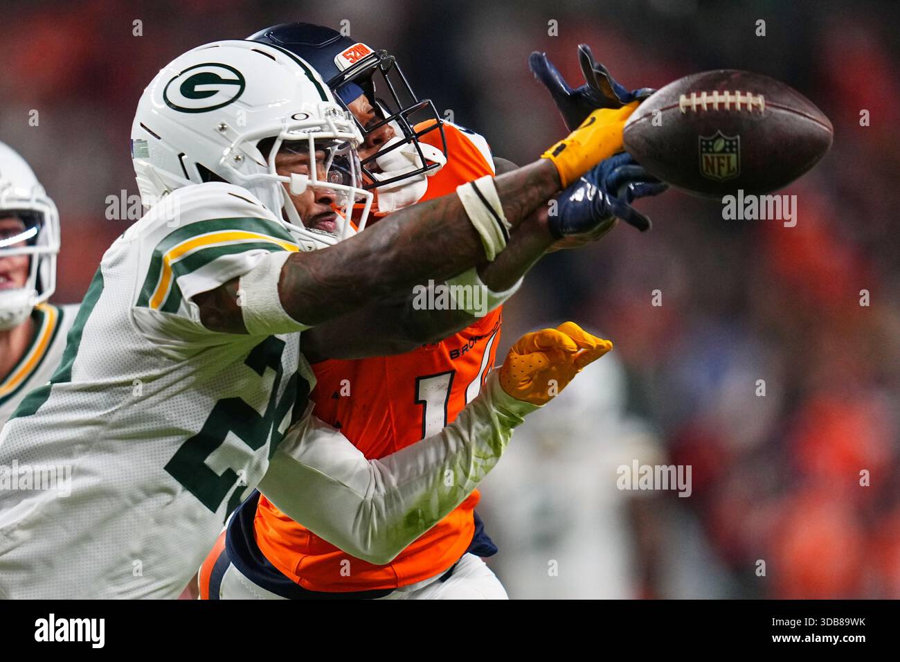 Green Bay Packers' Xavier McKinney breaks up a pass intended for Denver ...
