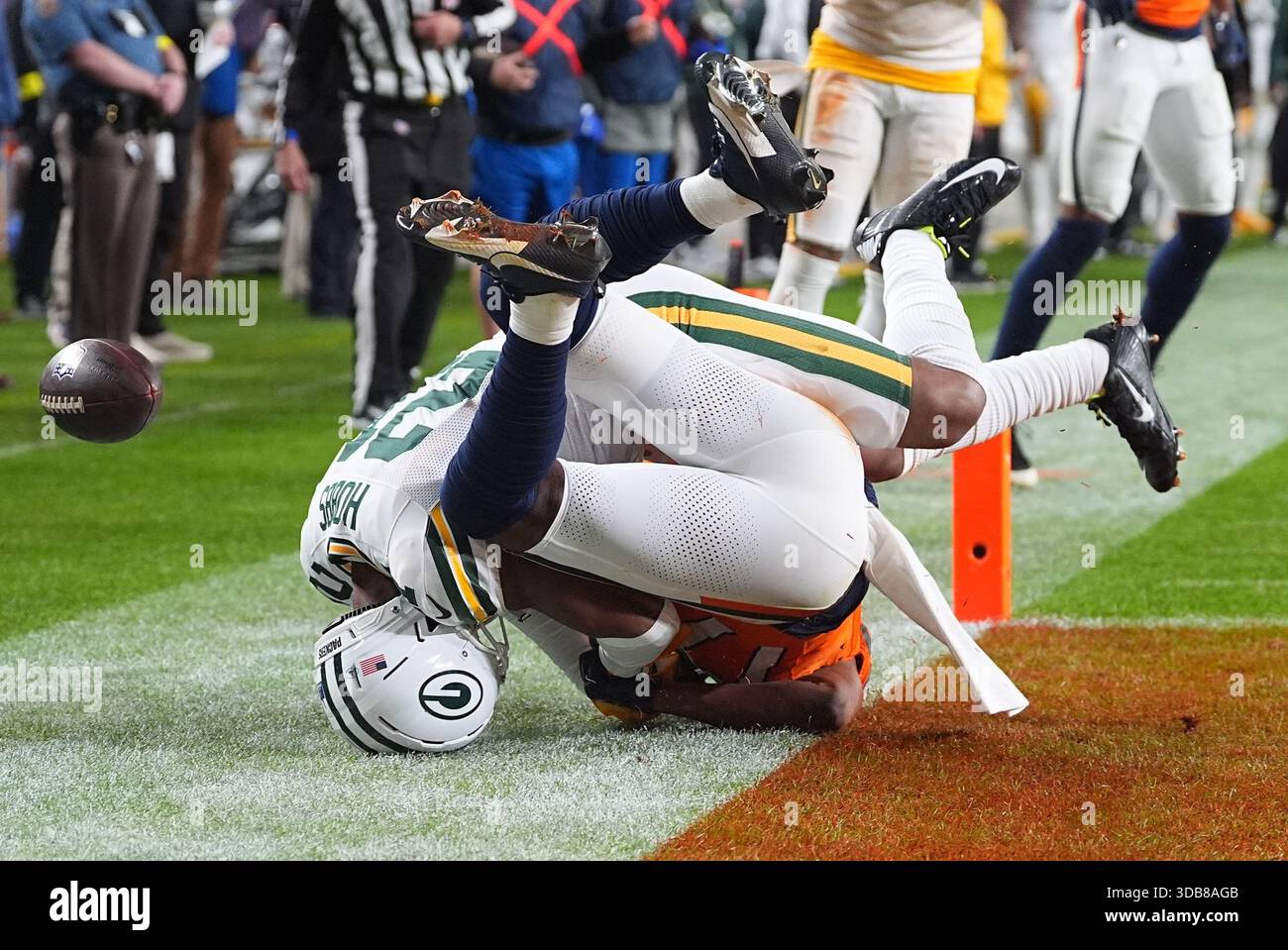 Green Bay Packers' Nate Hobbs breaks up a pass to Denver Broncos' Lil ...