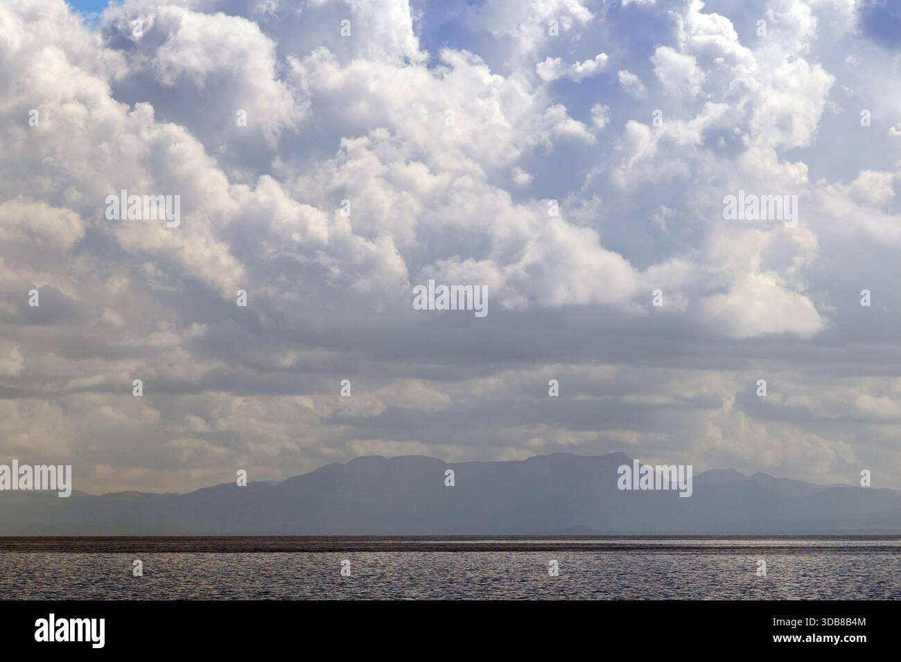 Distant view of the Cuban coastline seen from the deck of a passing ...