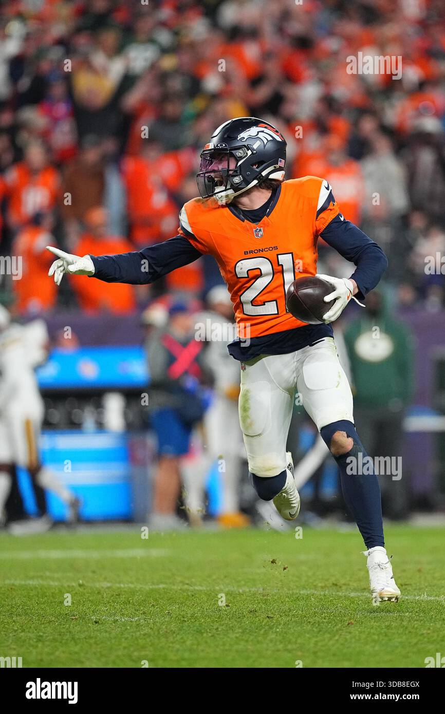 Denver Broncos cornerback Riley Moss (21) makes an interception against ...