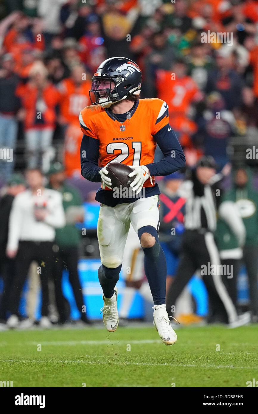 Denver Broncos cornerback Riley Moss (21) makes an interception against ...