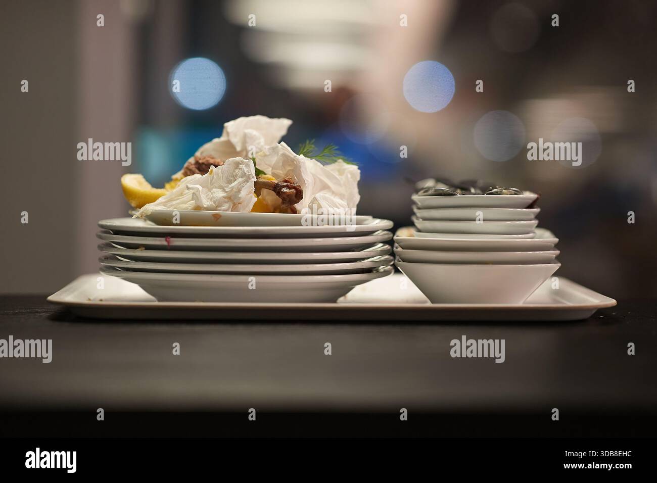 Plates, used dishes in a pile Stock Photo - Alamy
