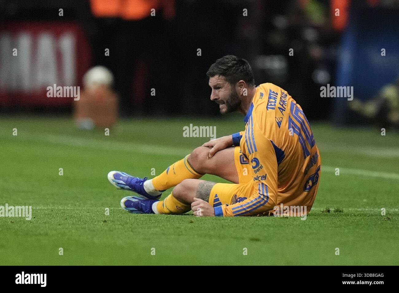 Tigres' Andre-Pierre Gignac lies on the pitch during the Mexican soccer league second leg final ...