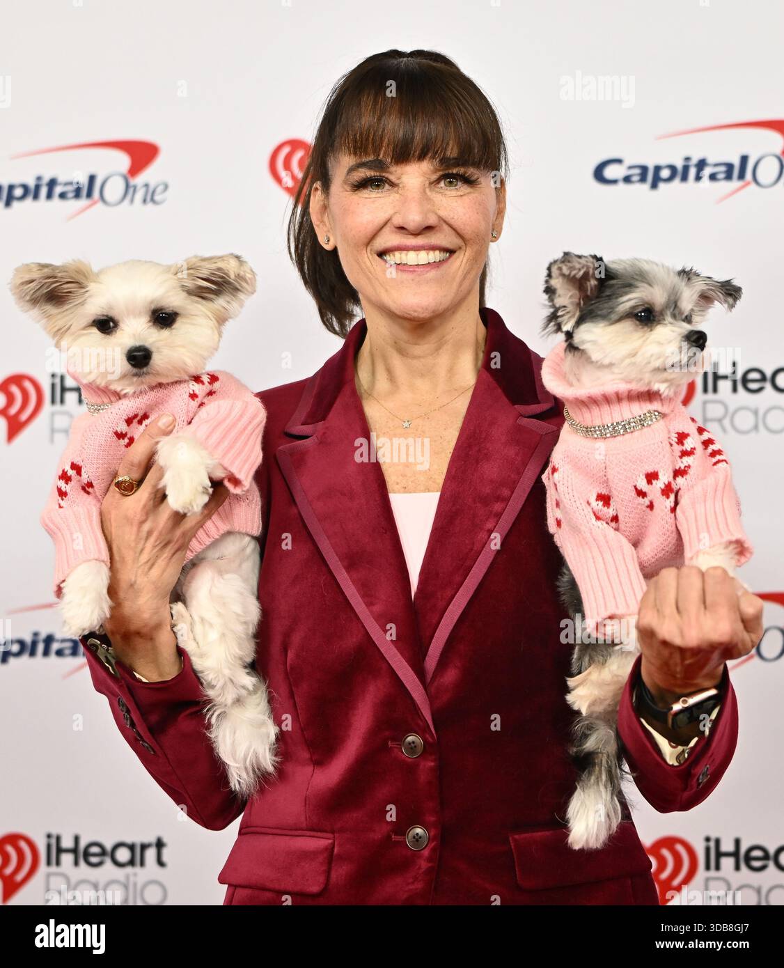 Belle the Dog, left, Sam Carrell and Tinkerbelle the Dog attend Z100's ...