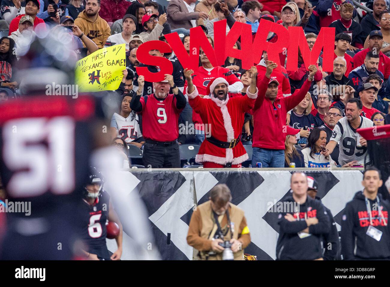 December 14, 2025: Houston Texans fans hold up letters forming a ...