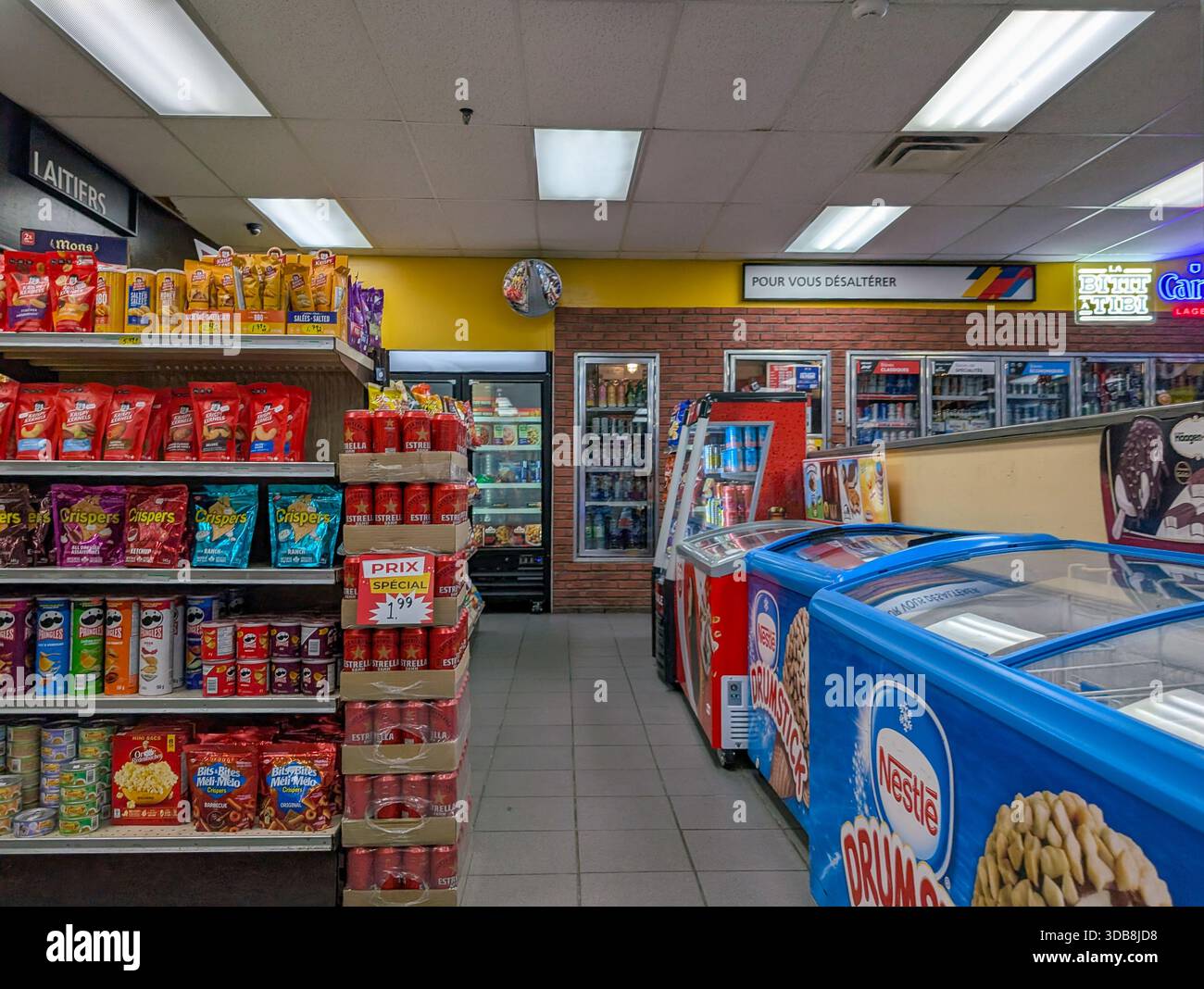 Canada, Quebec, 24 November 2025 : Colorful convenience store aisles ...