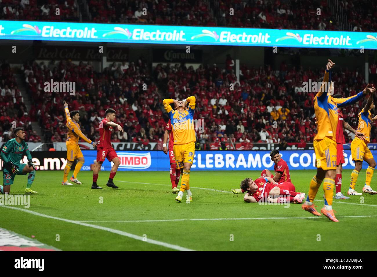 Tigres' Romulo Zwarg, center, reacts after missing a chance to scores ...