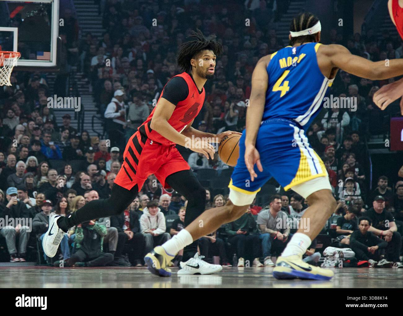 Portland Trail Blazers guard Shaedon Sharpe, left, brings the ball ...