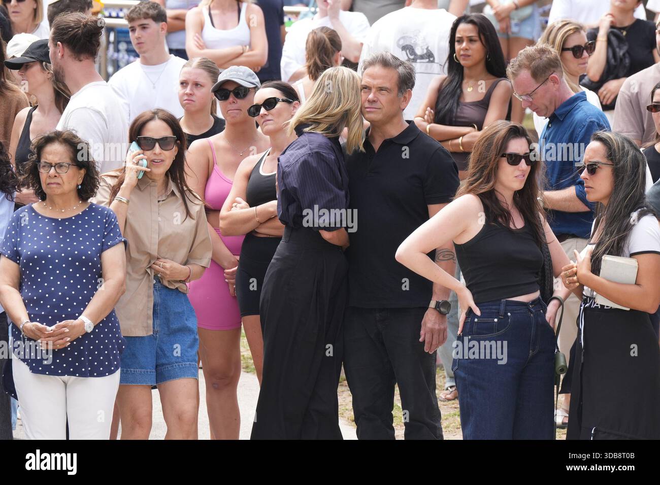 Lachlan Murdoch and his wife Sarah pay their respects at a tribute to ...