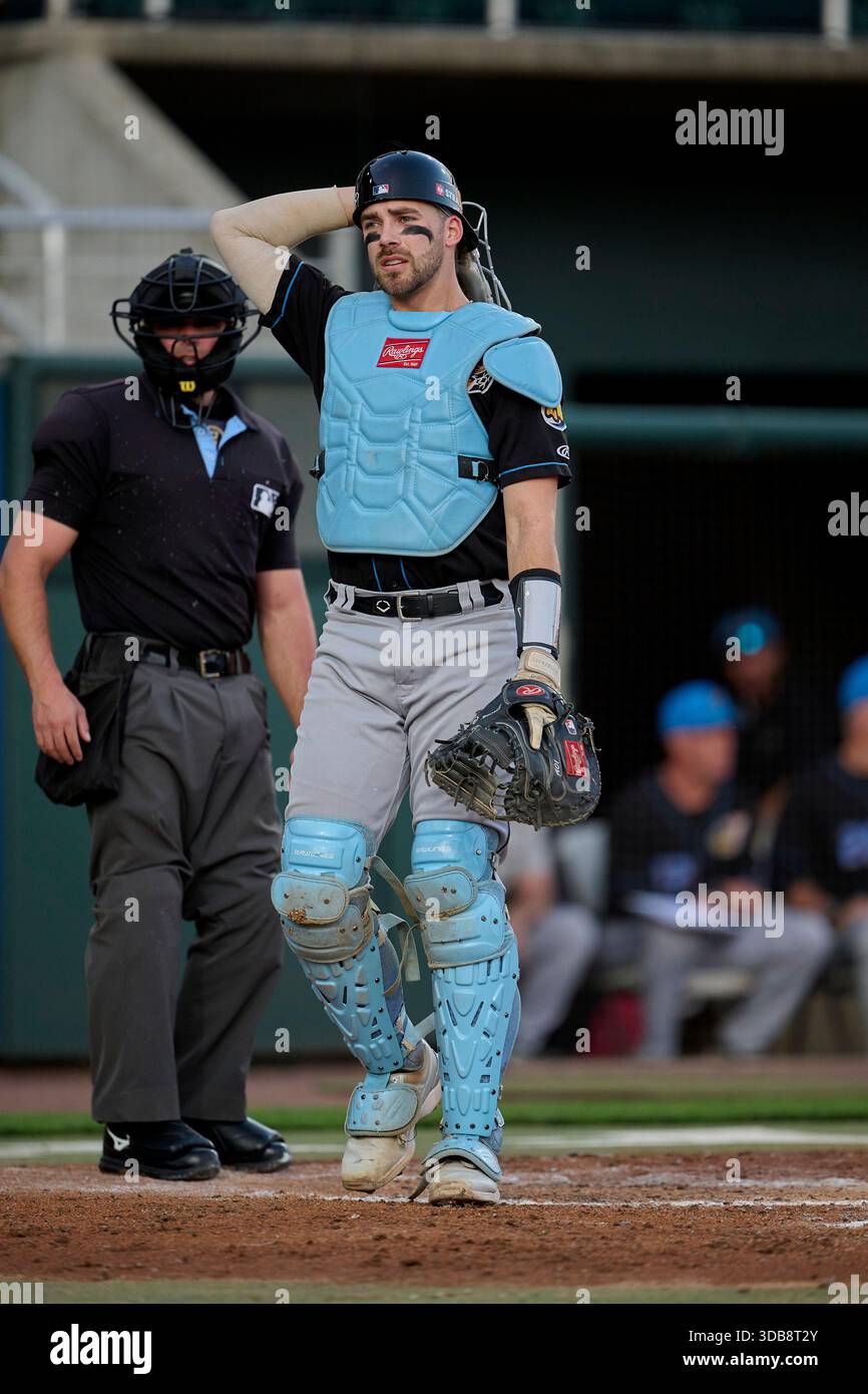 Akron RubberDucks catcher Jacob Cozart (17) tracks a foul ball popup ...
