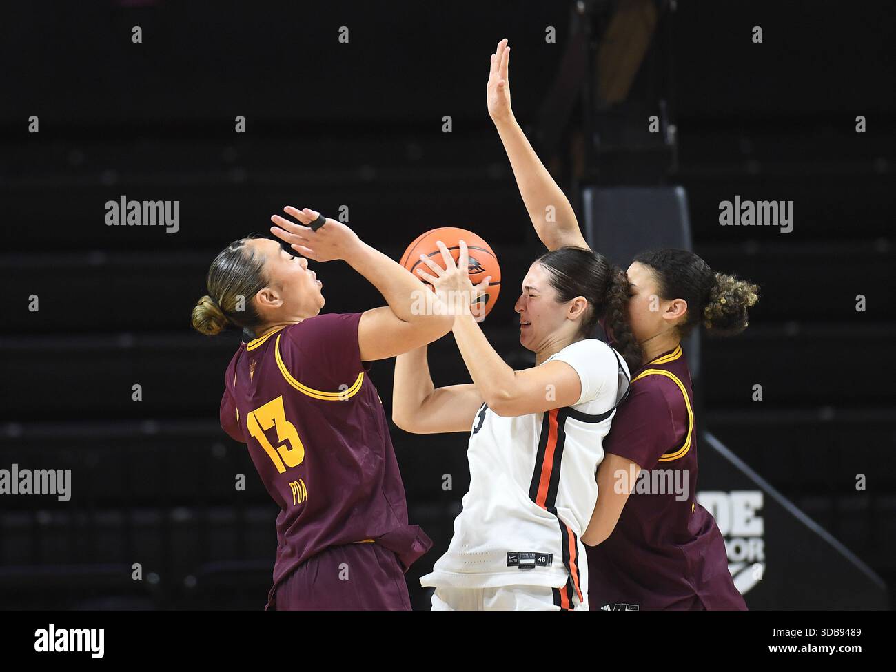 Oregon State guard Jenna Villa (3) passes in between Arizona State ...