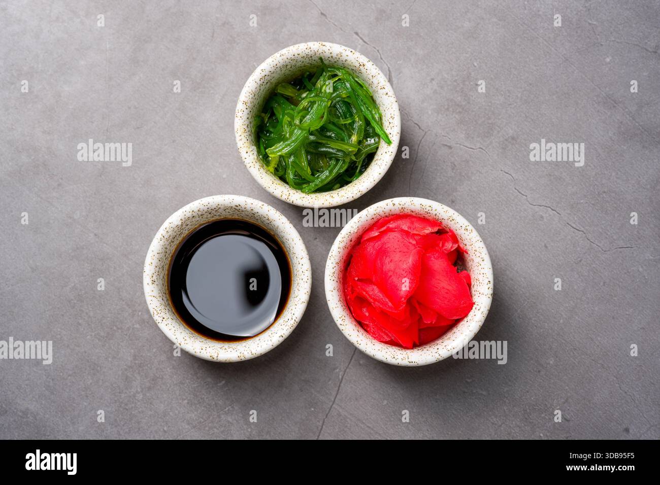 Top view of sushi garnishes arranged on neutral surface Stock Photo - Alamy