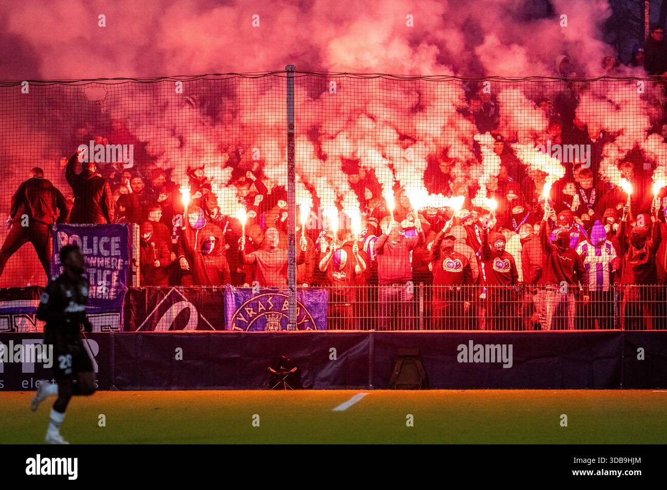 Aarhus, Denmark. 14th, December 2025. Football fans of OB seen on the ...