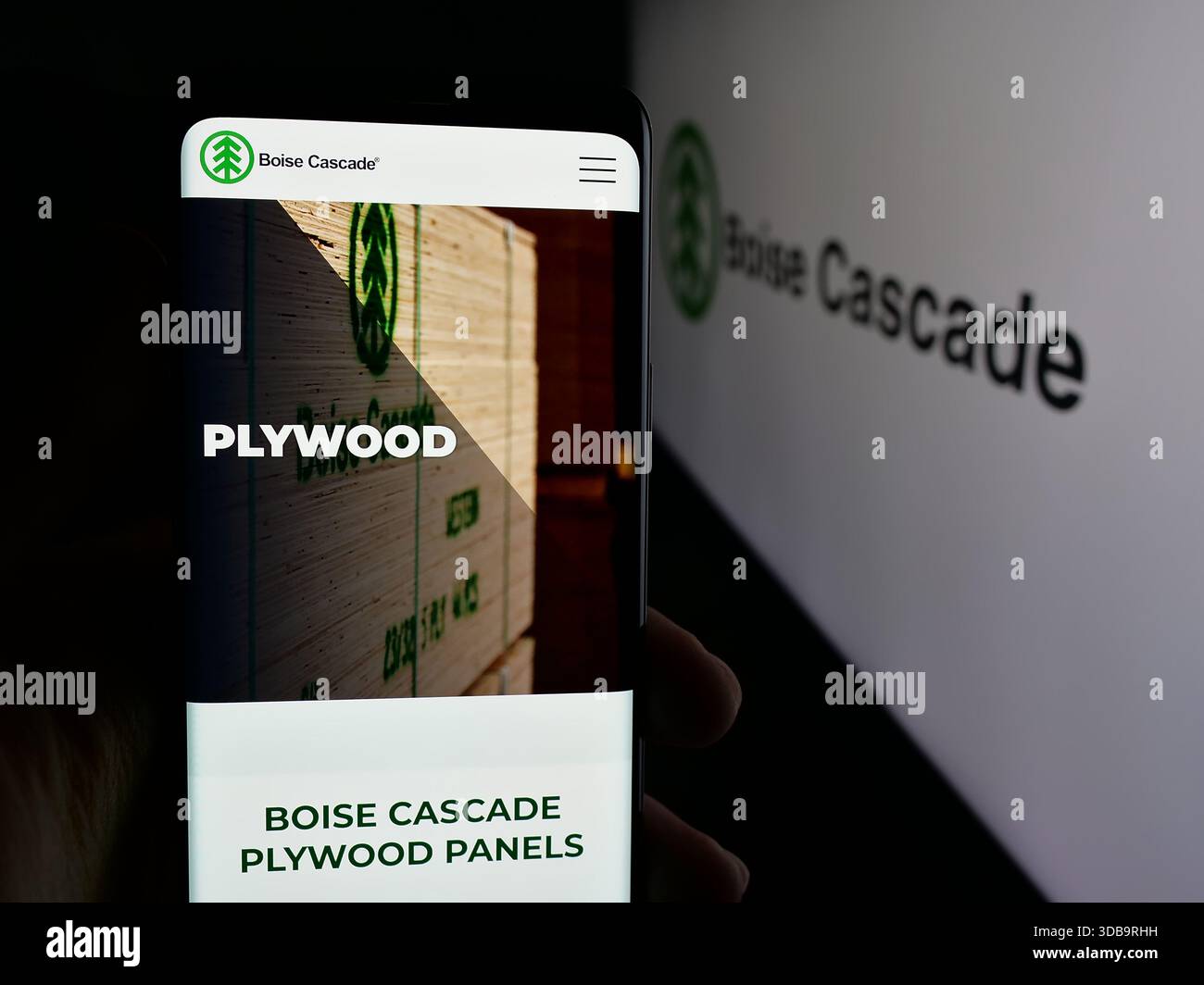 In this photo illustration, a person is holding a cellphone with the ...