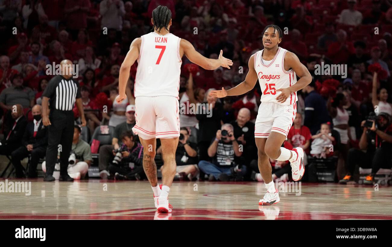 Houston guard Mercy Miller (25) celebrates his basket with Milos Uzan ...