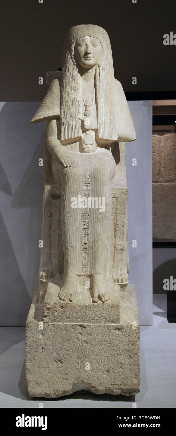 Seated statue of Merit, the Maya's wife, singer of Amun. Limestone ...