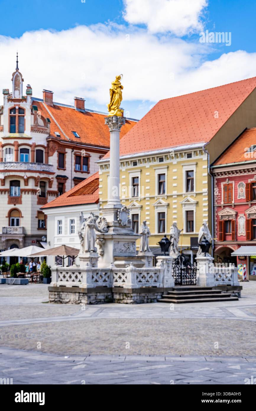 Colorful historic buildings, Town Hall and the Plague Column on Glavni ...