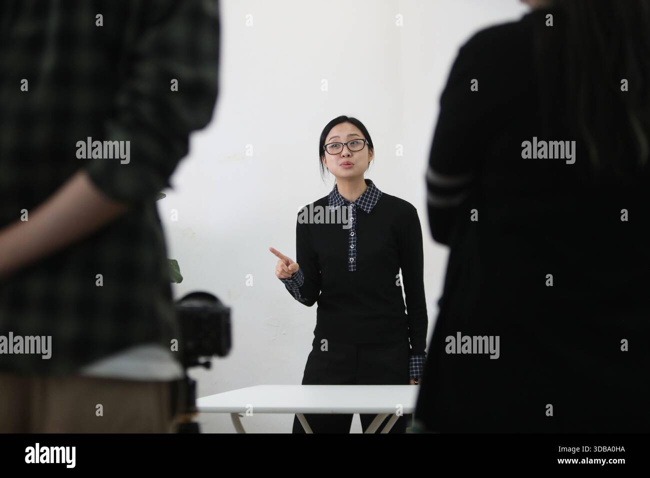 Misun Youm, actor, performs a scene for an English-language demo reel ...