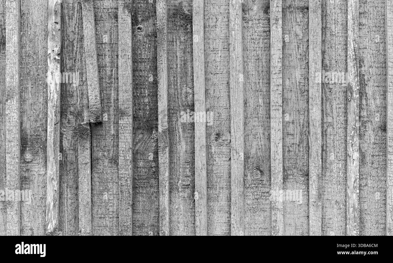 Vintage gray wooden wall with a weathered texture, showcasing rustic ...