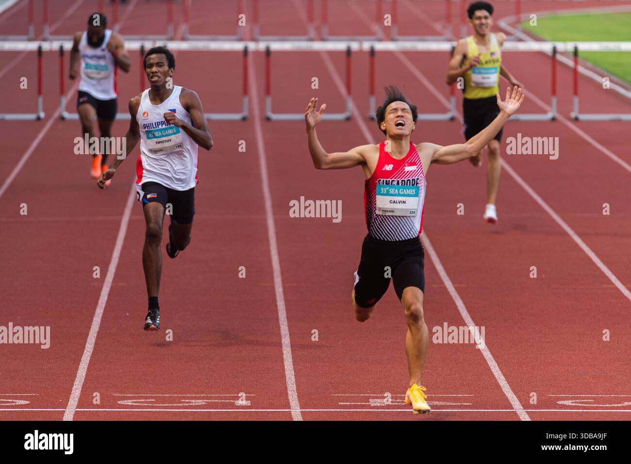 Calvin Quek Jun Jie (C-R) of Singapore celebrates after won a gold ...