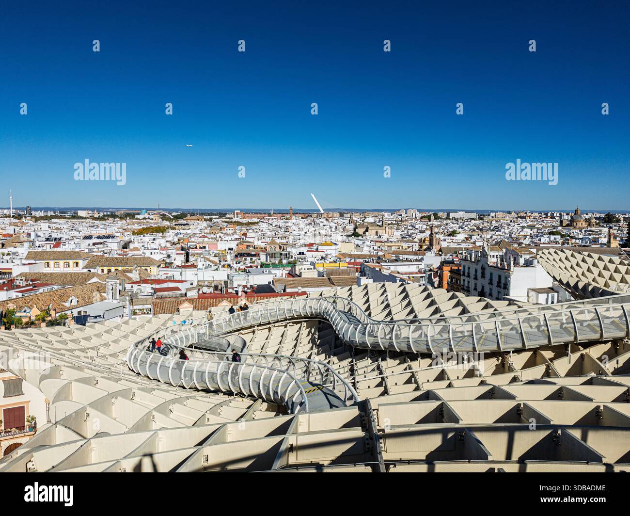 North view of Seville shows rooftops and a wooden structure. The scene ...
