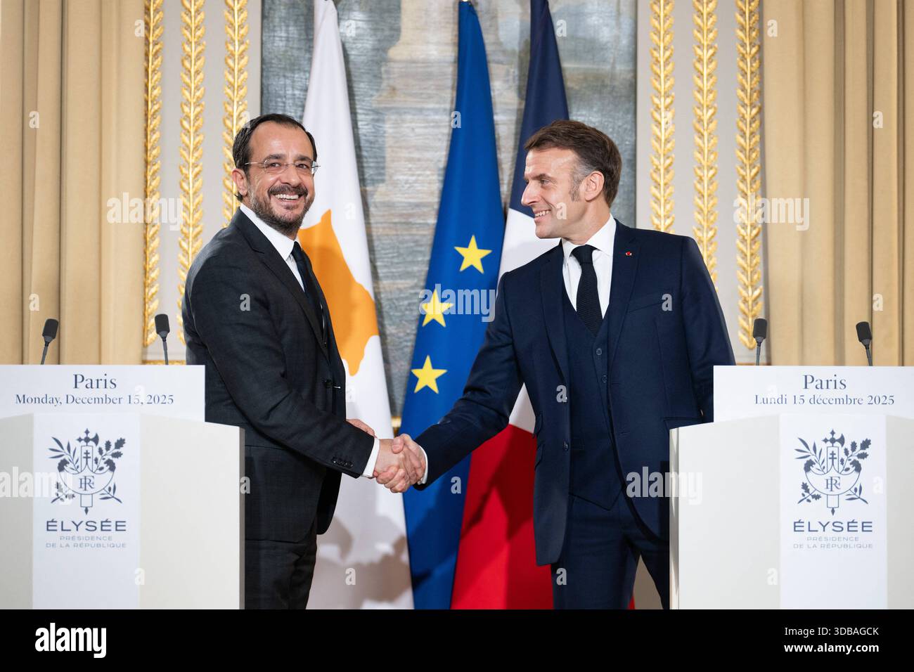 Handshake between French President Emmanuel Macron and Cyprus President ...
