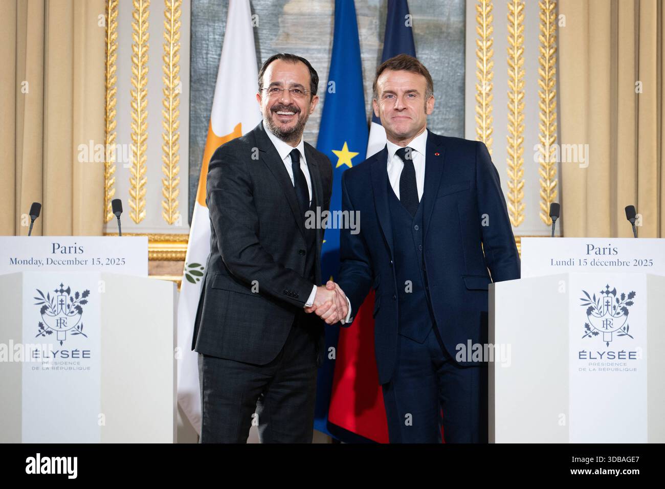 Handshake between French President Emmanuel Macron and Cyprus President ...