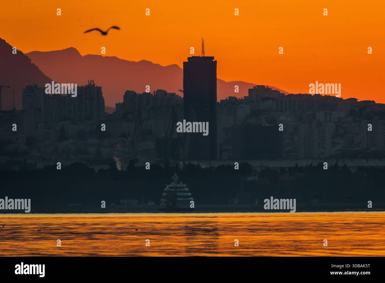 Sun Peaks Above Horizon while painting memorable sunrise over city of ...